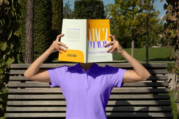 Person Reading Color Pop Magazine With Cover Mockup Psd - Mockup Hunt
