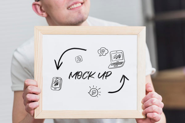 Smiley Man Holding Mock-Up Frame Psd - Mockup Hunt
